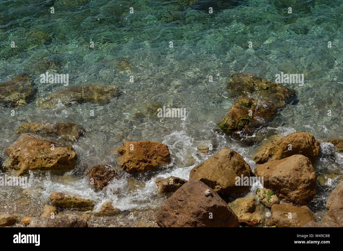 Crystal clear beach on French riviera- Nice Stock Photo - Alamy
