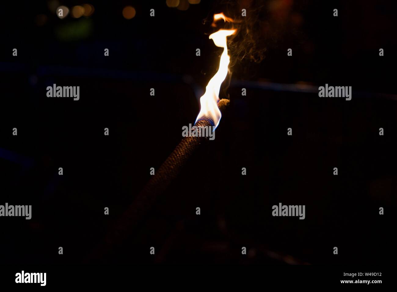 A flaming torch Stock Photo - Alamy