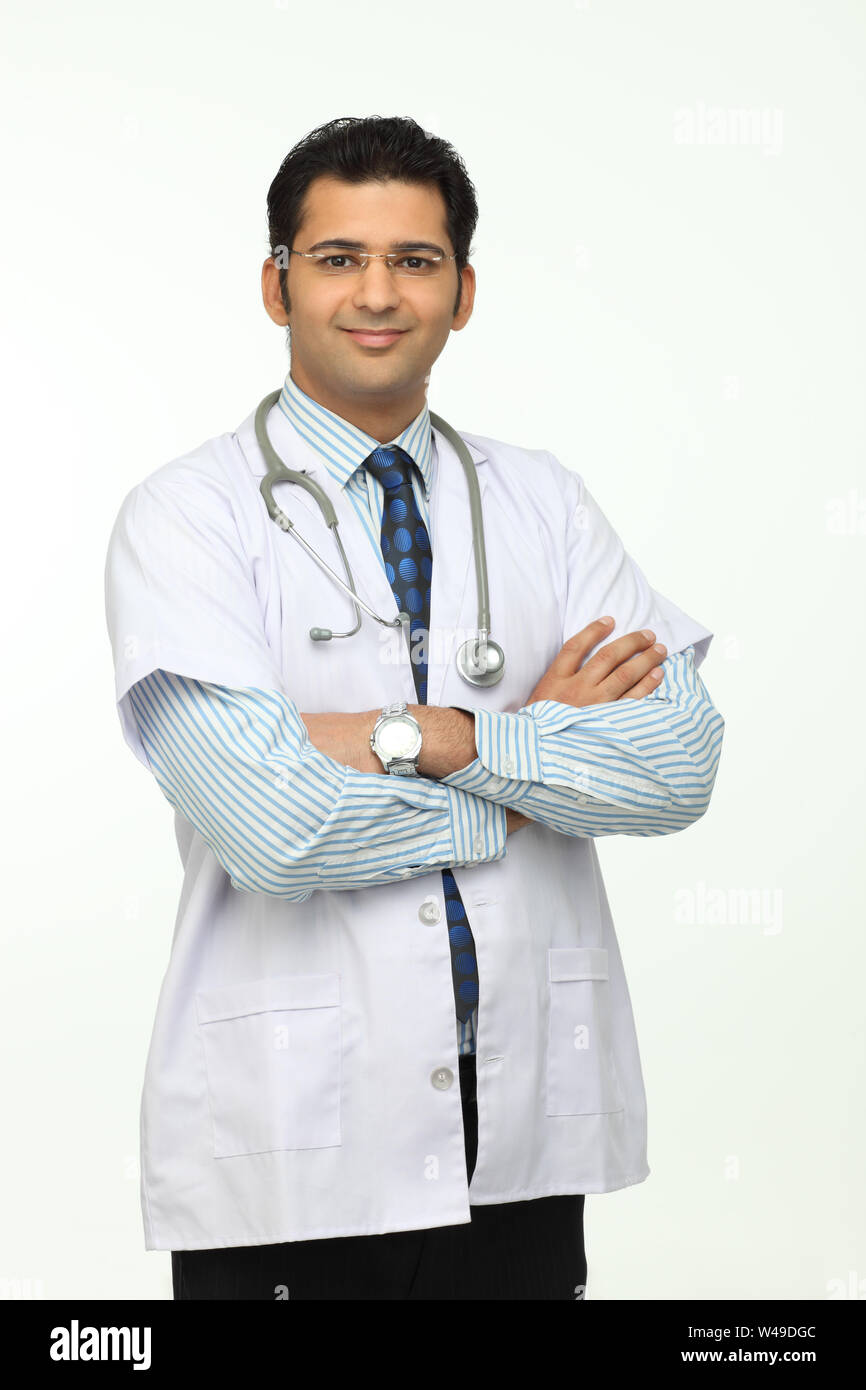 Confident indian male young doctor standing with his arms crossed Stock ...