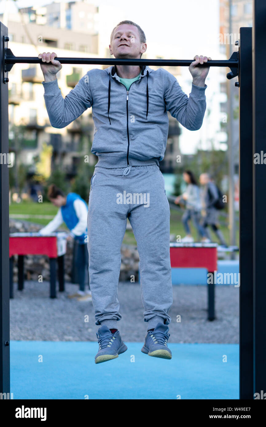 Exercise pulls man hi-res stock photography and images - Alamy