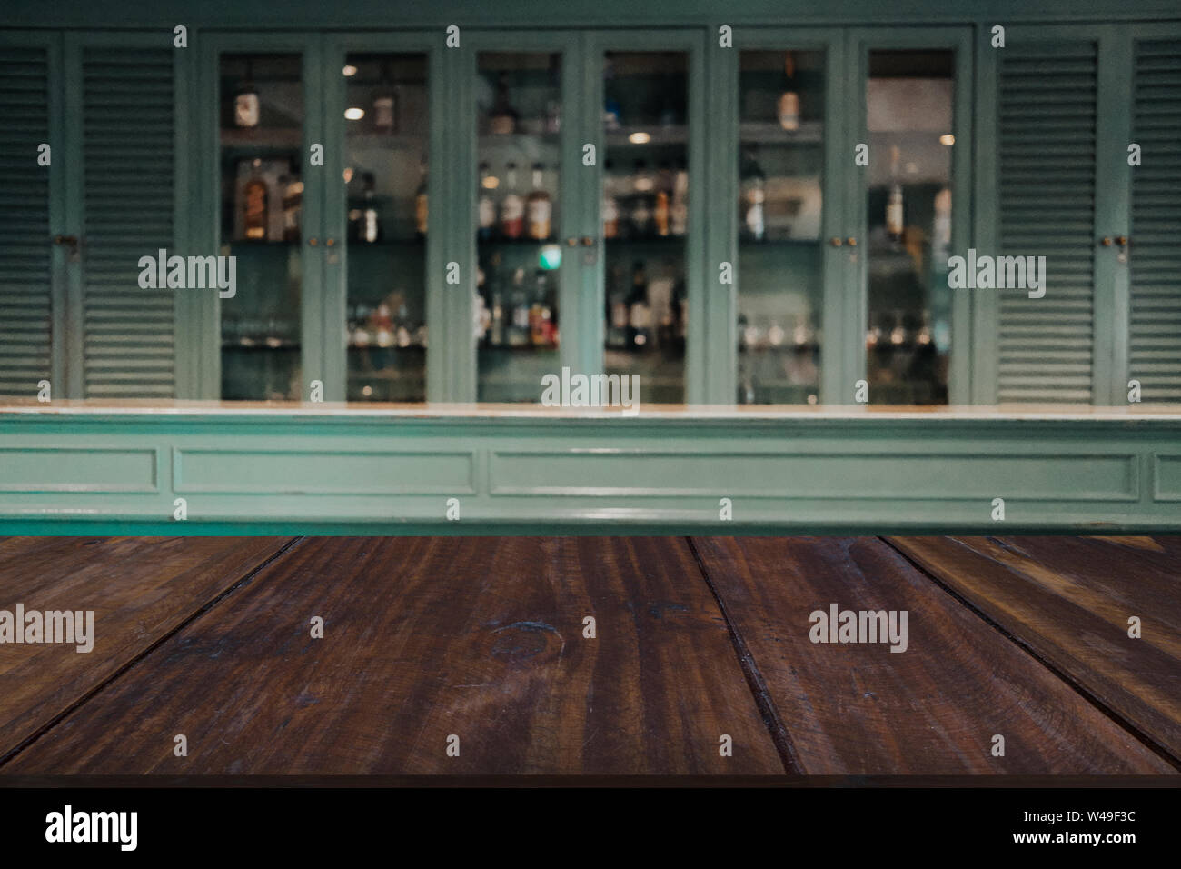 blue bar pub counter in cafeteria restaurant. defocused blur background ...