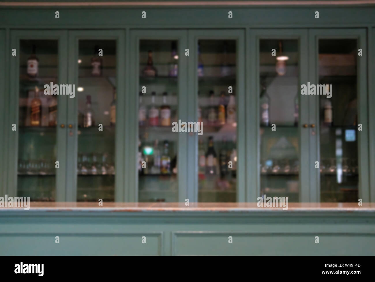 blue bar pub counter in cafeteria restaurant. defocused blur background ...