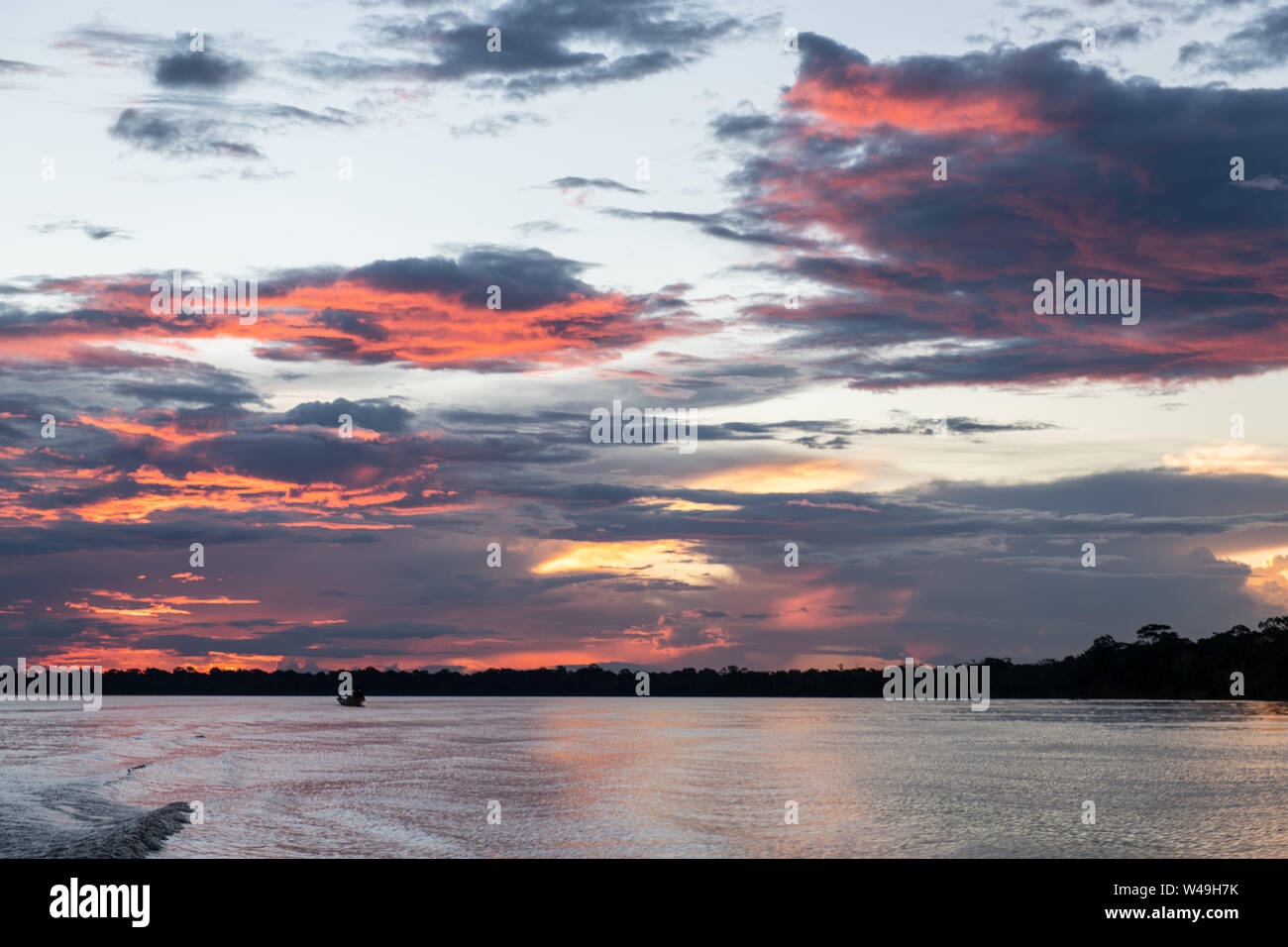 Sunset on the Peruvian Amazon River Stock Photo - Alamy
