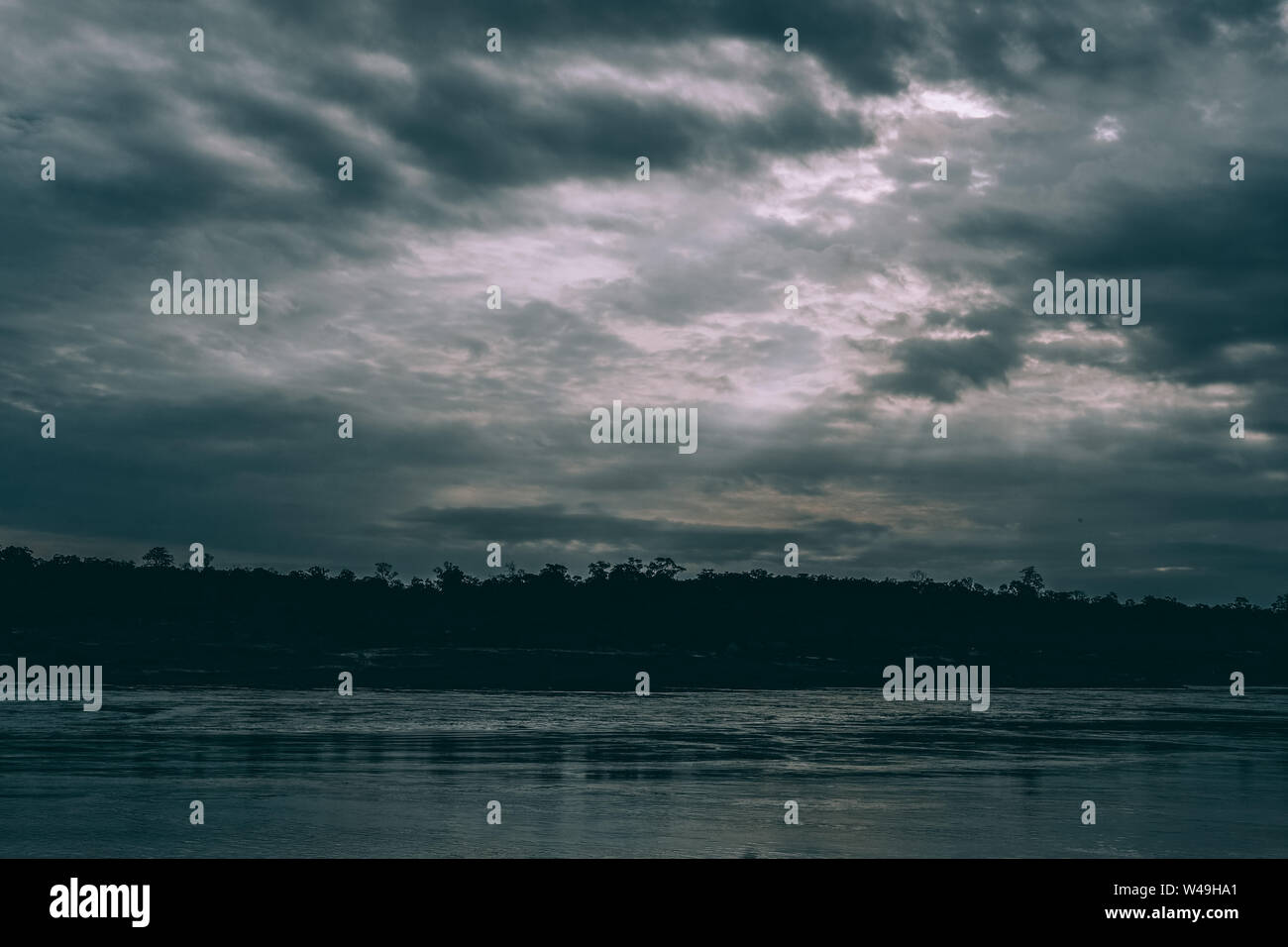 water stream river flowing & light ray at night Stock Photo - Alamy