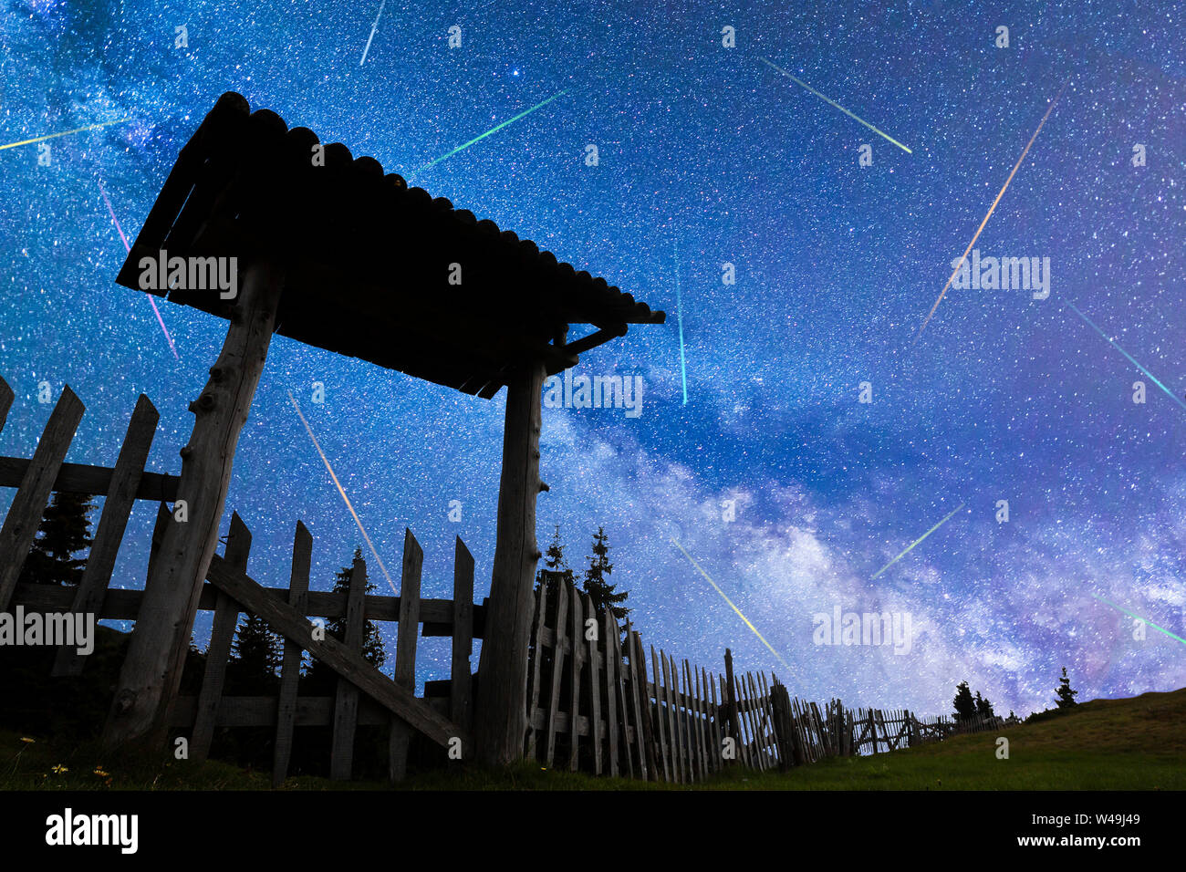 A view of a Meteor Shower and the blue Milky Way with wooden entrance ...