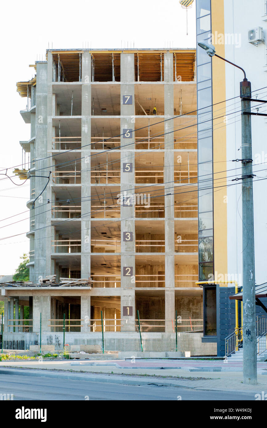 Modern building under construction detail, concrete frame, window ...