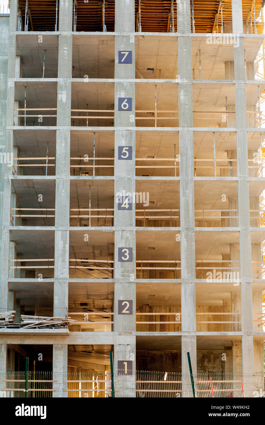 Modern building under construction detail, concrete frame, window ...