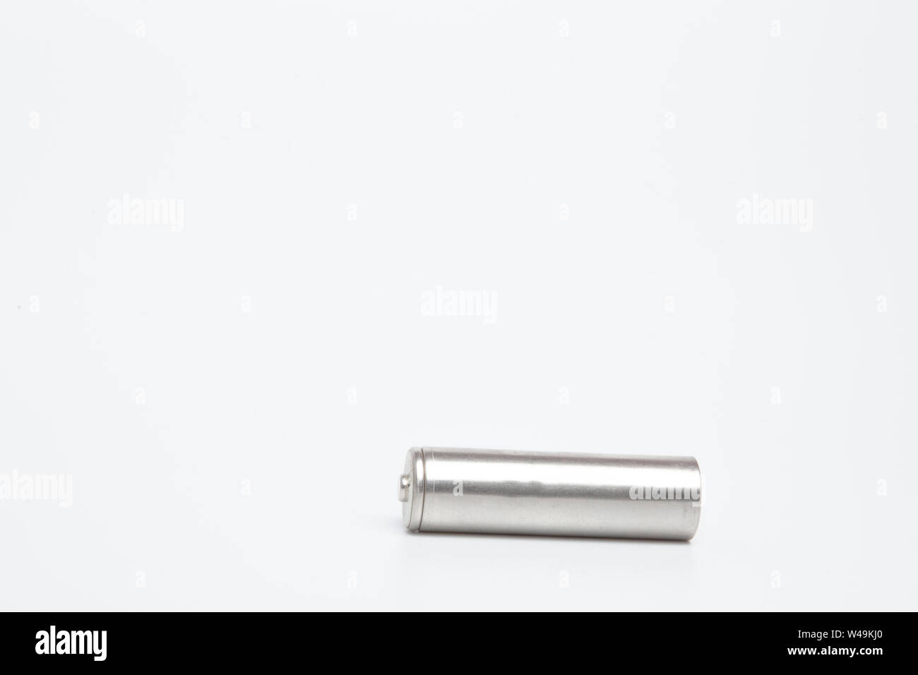 Close up grey AA batteries over white background with clipping path ...