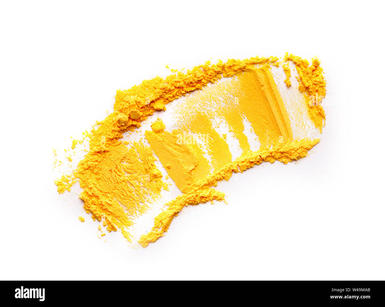 Yellow Holi powder smear on white background Stock Photo - Alamy