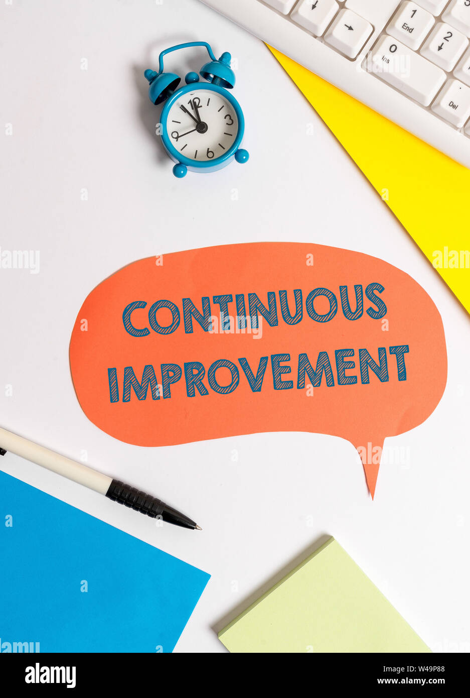 Writing note showing Continuous Improvement. Business concept for ...