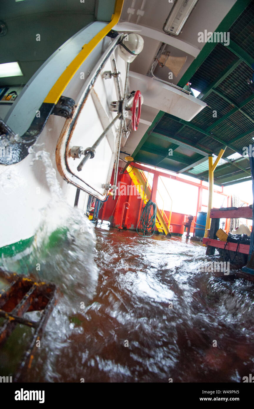 water splash on deck during monsoon season at sea Stock Photo - Alamy