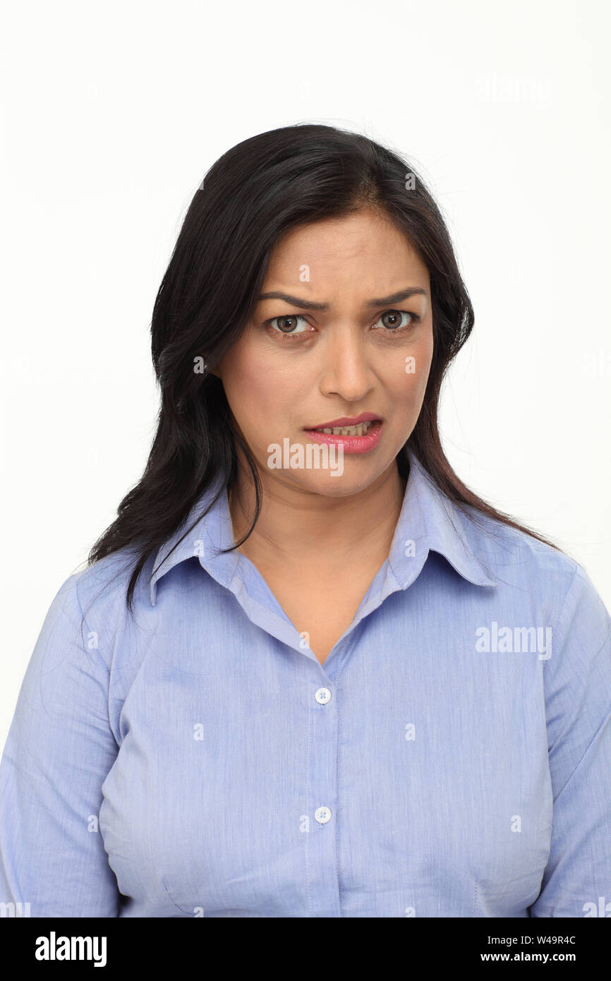 Portrait of a woman grimacing Stock Photo - Alamy