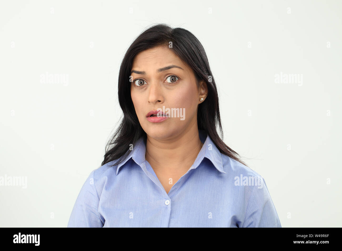 Shocked woman face looking down hi-res stock photography and images - Alamy