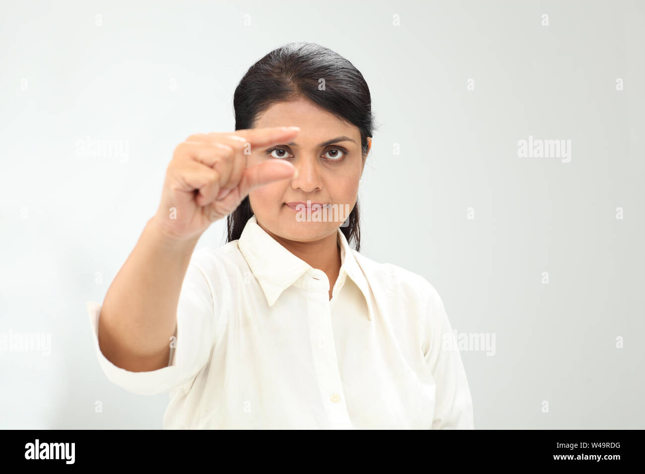 Woman with fingers showing size hi-res stock photography and images - Alamy