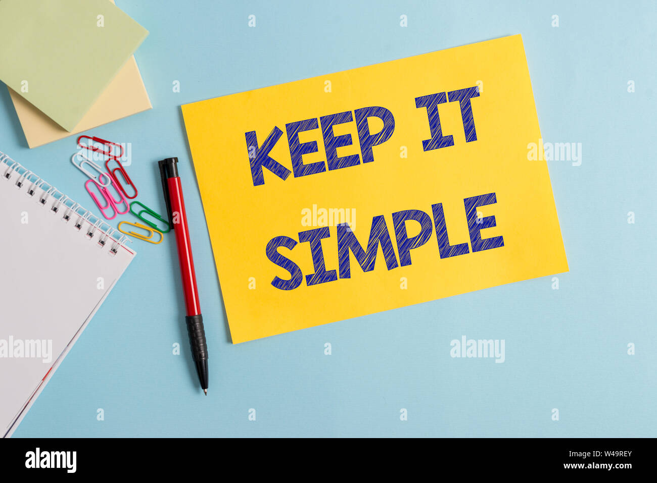 Writing note showing Keep It Simple. Business concept for to make ...