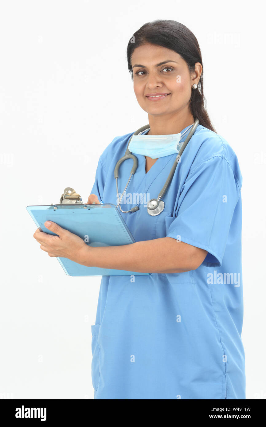Female doctor writing prescription Stock Photo - Alamy