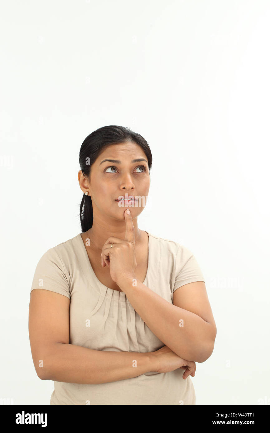 Indian woman thinking Stock Photo - Alamy