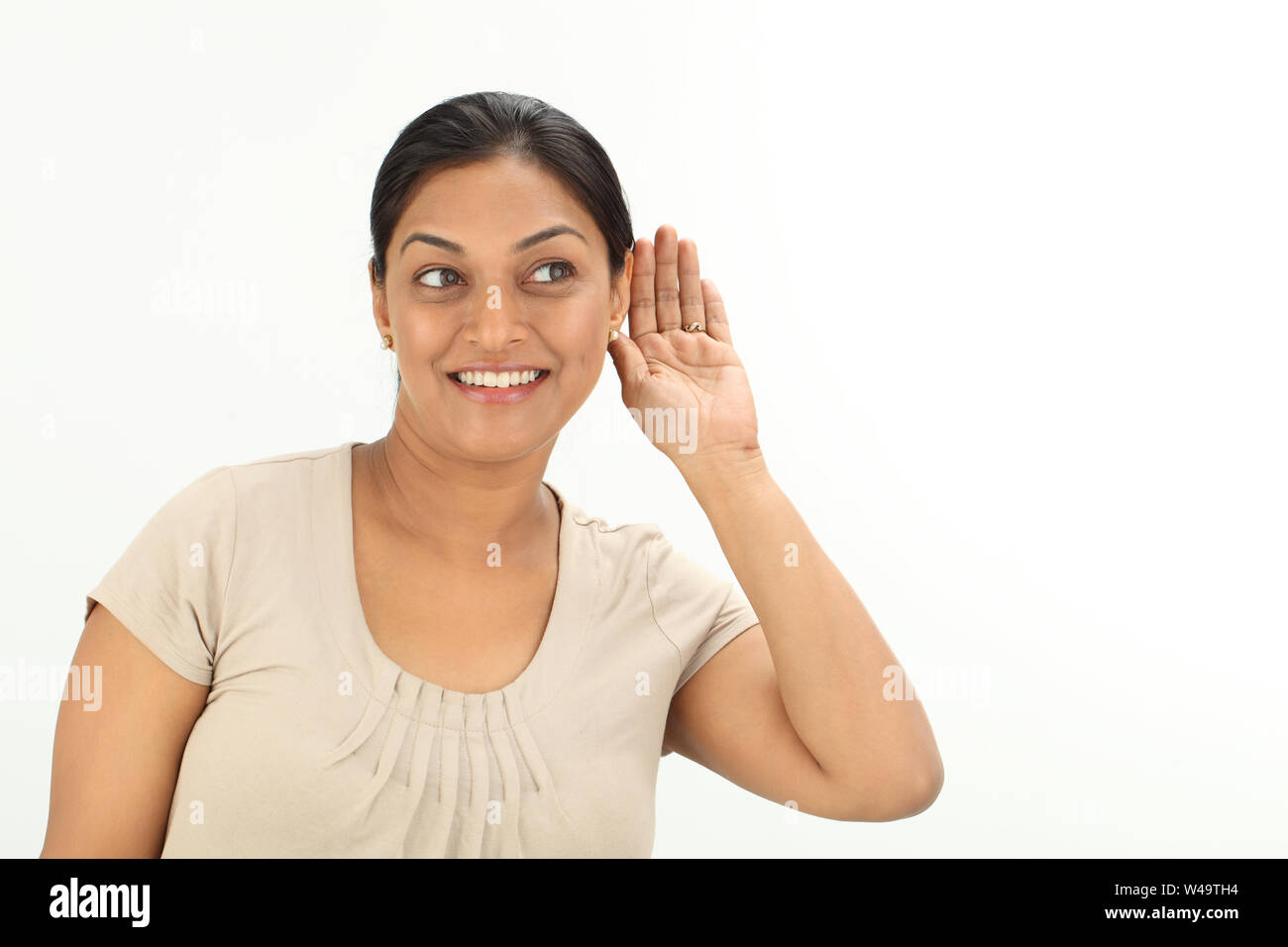 Hand cupped to ear hi-res stock photography and images - Alamy