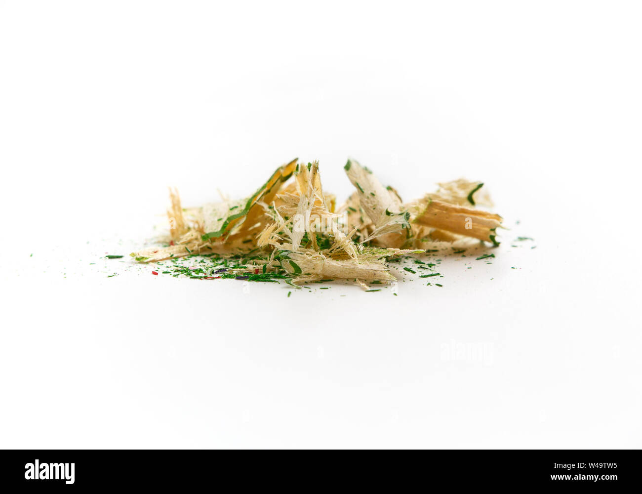 Wooden flakes and graphite of green color pencil Stock Photo - Alamy