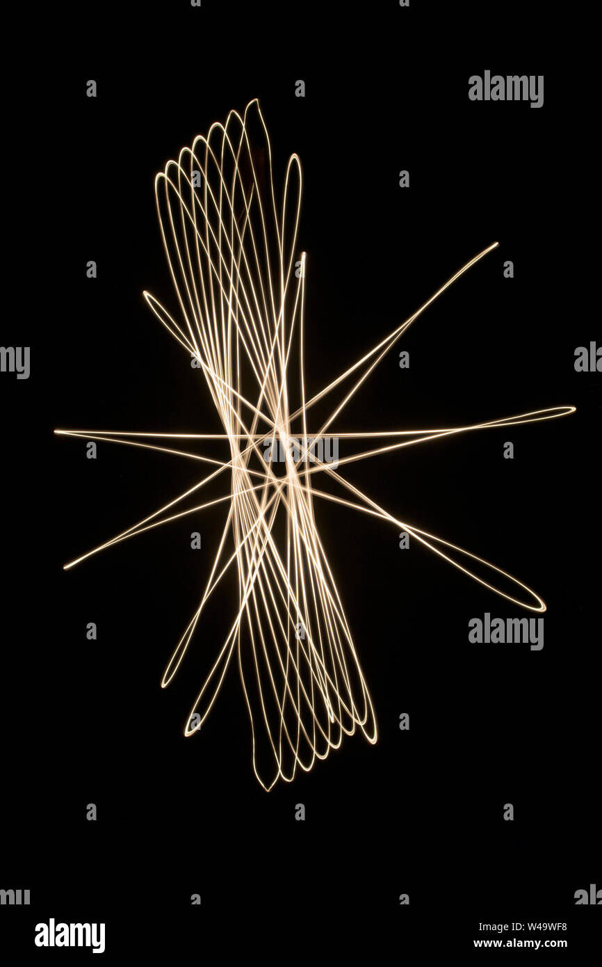 Light trails and patterns against black background Stock Photo - Alamy
