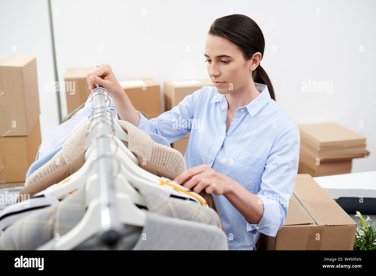 Woman in contemporary clothes hi-res stock photography and images - Alamy