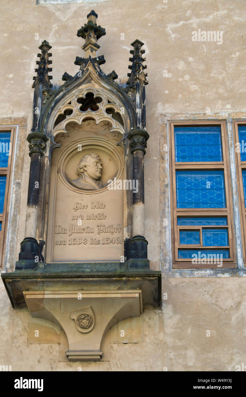 Low angle view of text on building wall Stock Photo - Alamy