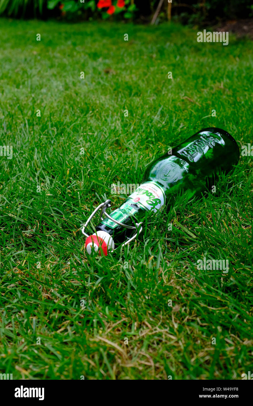 Beer bottle thrown away hi-res stock photography and images - Alamy