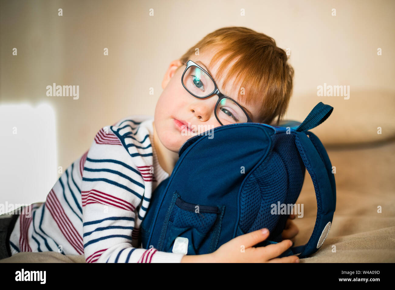 little ginger boy in the glasses with syndrome dawn playing with ...