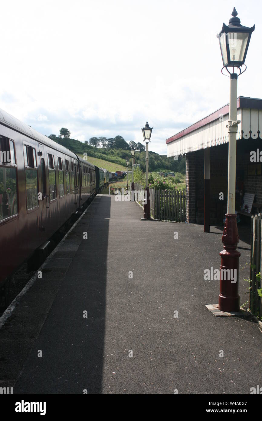 Platform of a restored steam railway station at Cheddleton ...