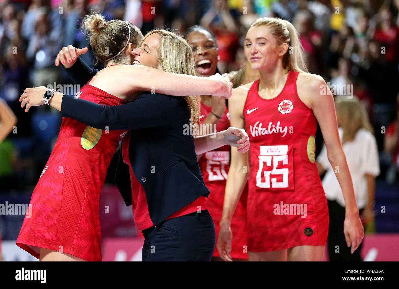 England coach Tracey Neville celebrates with Joanne Harten (left) after ...