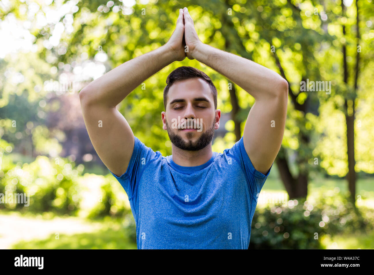 Close up caucasian man meditating hi-res stock photography and images ...
