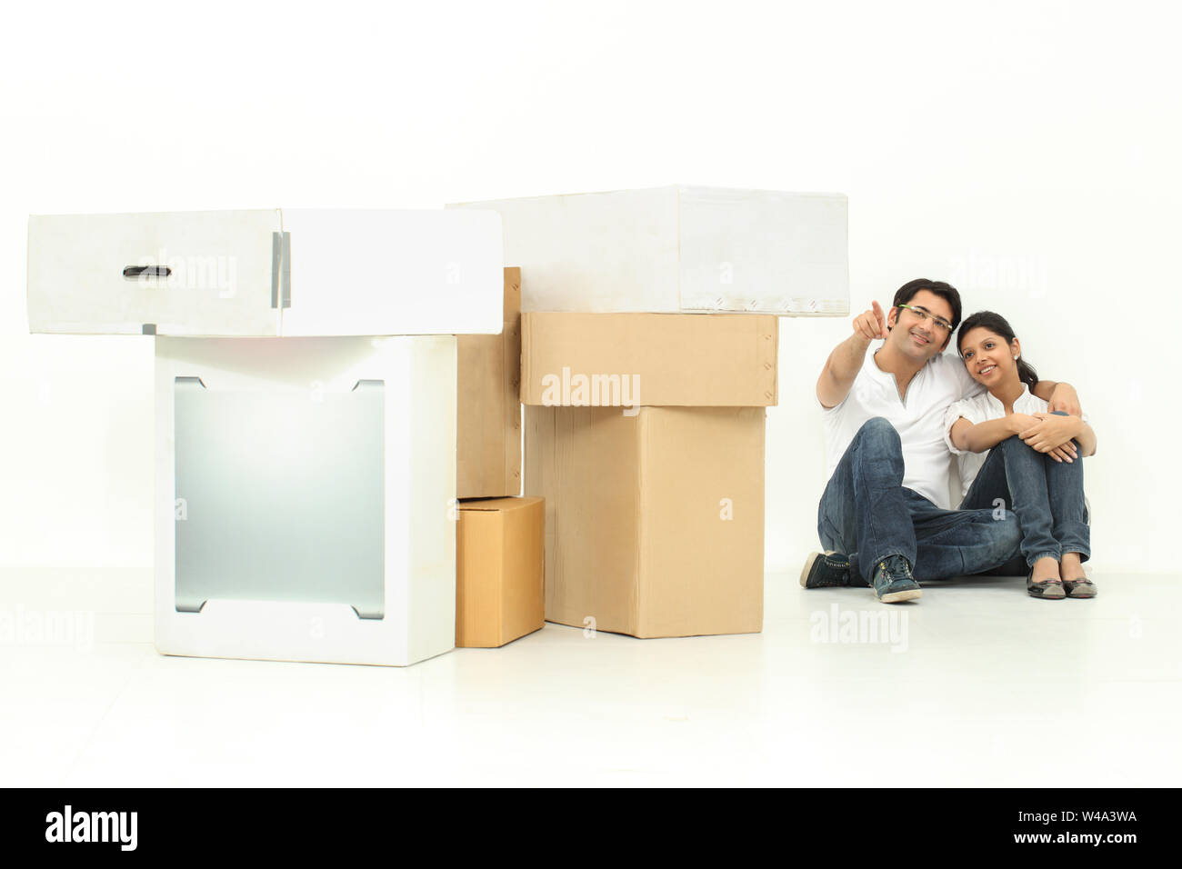 Young woman pointing cardboard Cut Out Stock Images & Pictures - Alamy