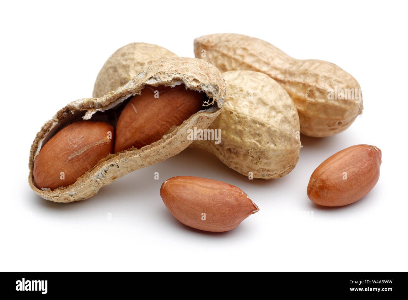 Peanuts isolated on white background, macro shot Stock Photo - Alamy