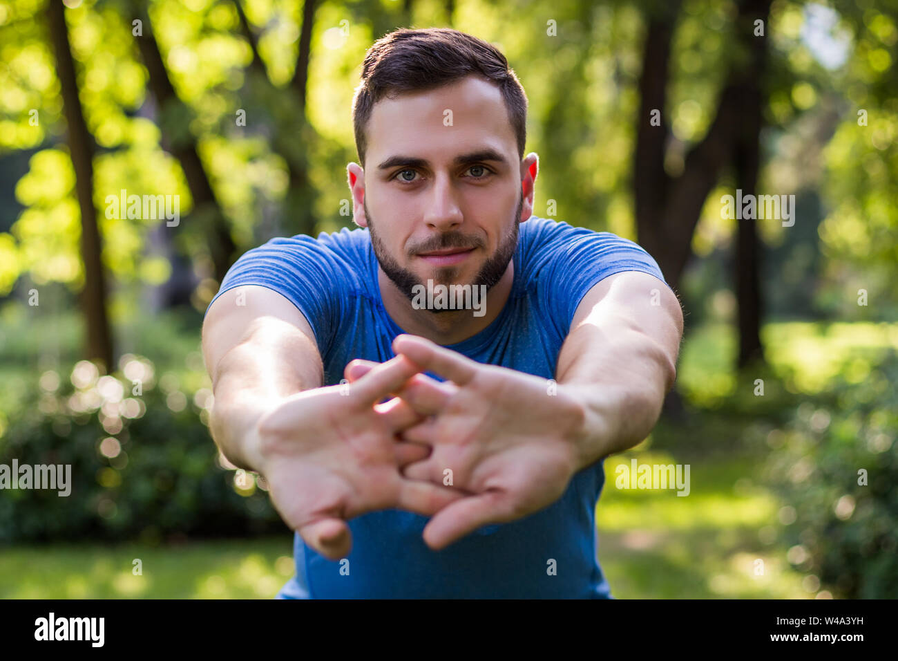 Handsome man looking back running hi-res stock photography and images ...
