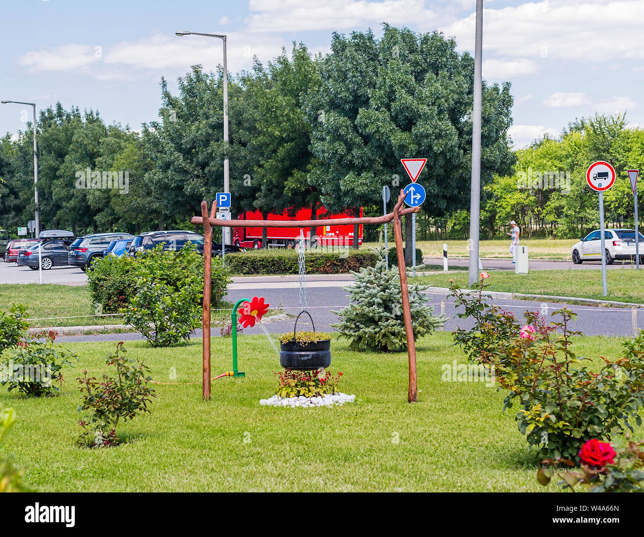Water road sprinkler hi-res stock photography and images - Alamy