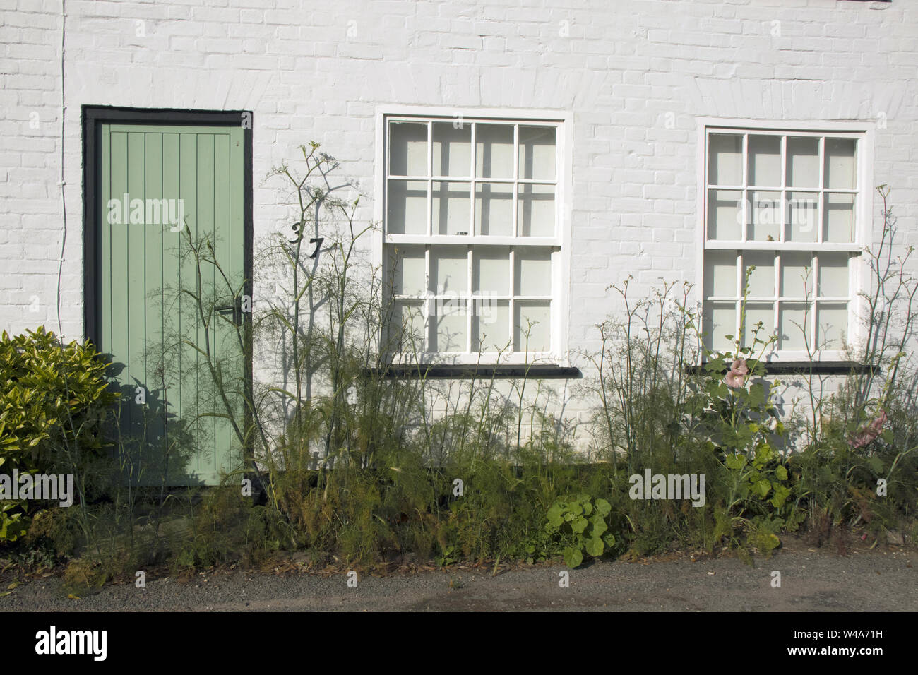 Detail of a white-painted house in the village of Wangford, Suffolk ...