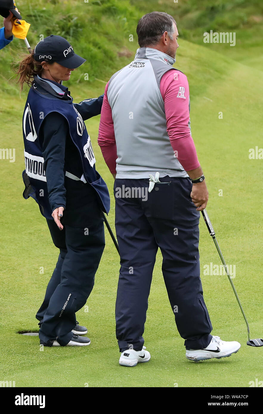 England's Lee Westwood (right) with caddy and girlfriend Helen Storey ...