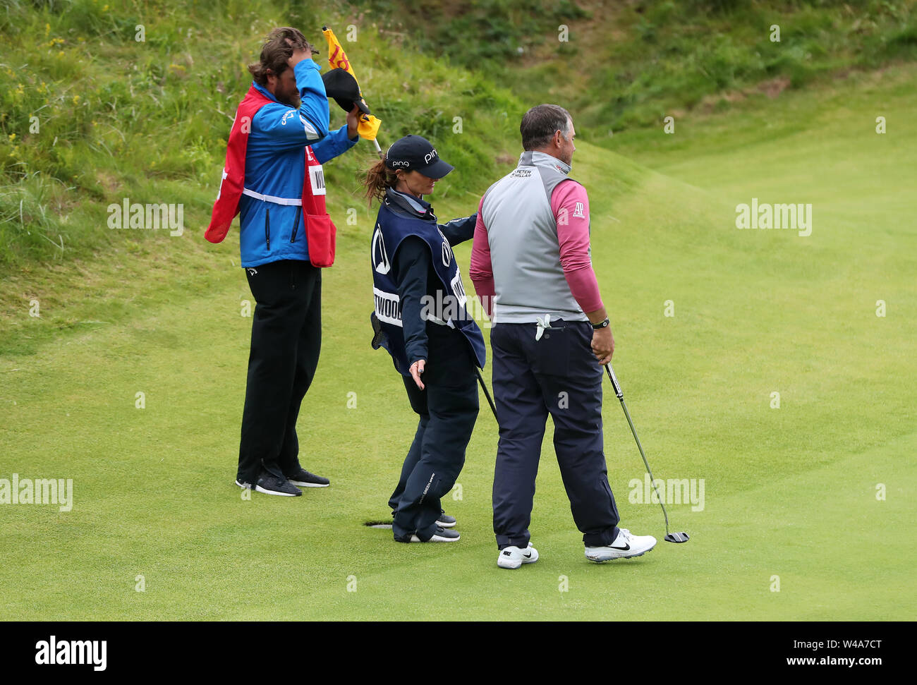 England's Lee Westwood (right) with caddy and girlfriend Helen Storey ...