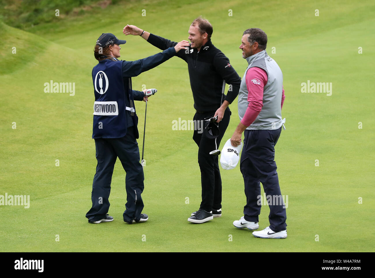 Caddy Helen Storey (left), England's Danny Willett and England's Lee ...
