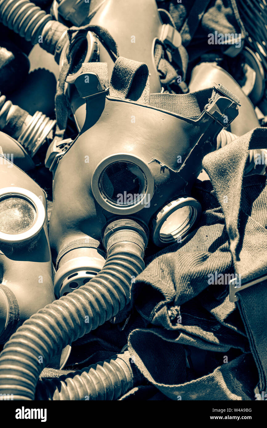 Close up background of old vintage protective gas respirator masks on ...