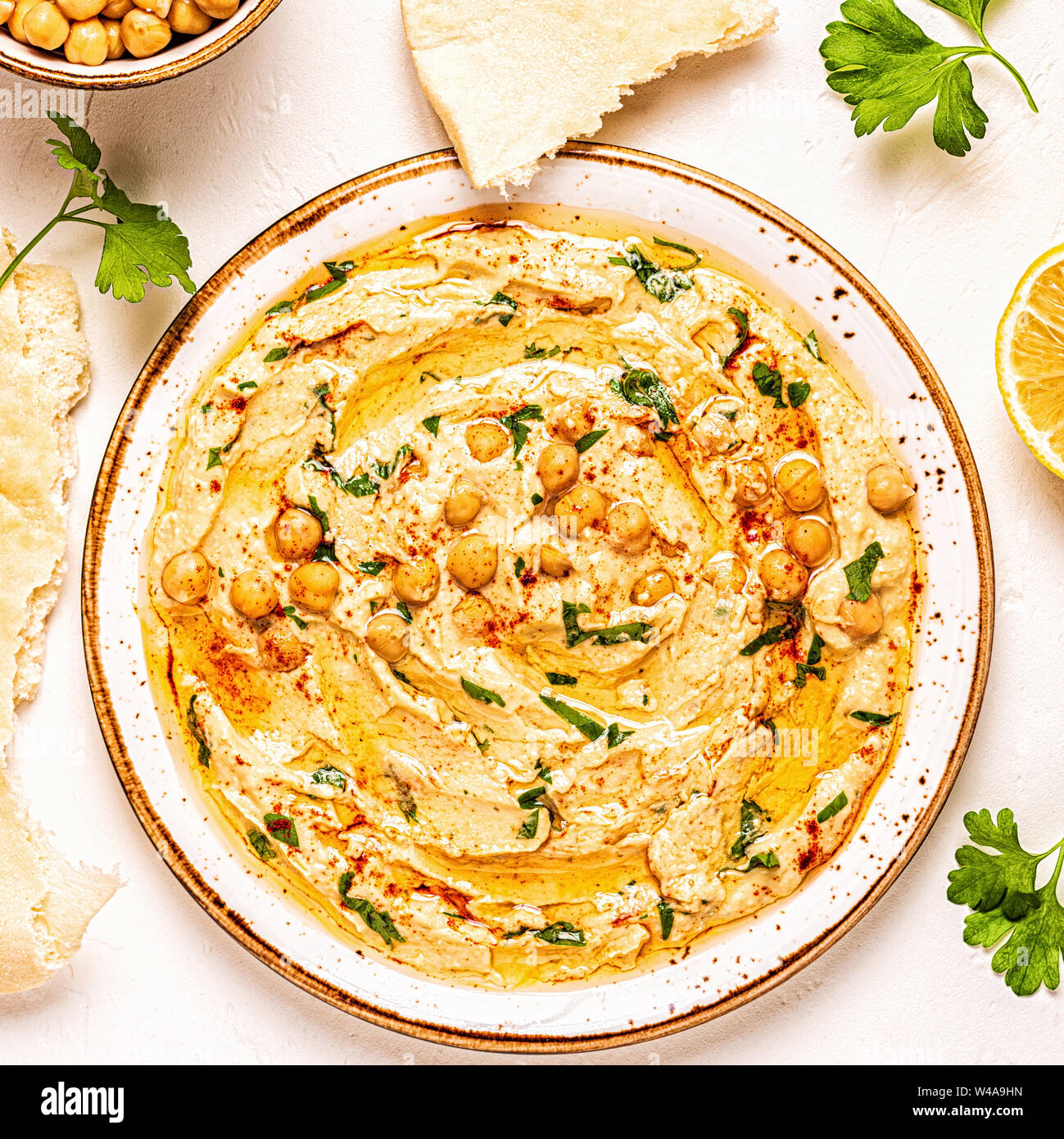 Homemade hummus, chickpea dip, with spices. Top view Stock Photo - Alamy