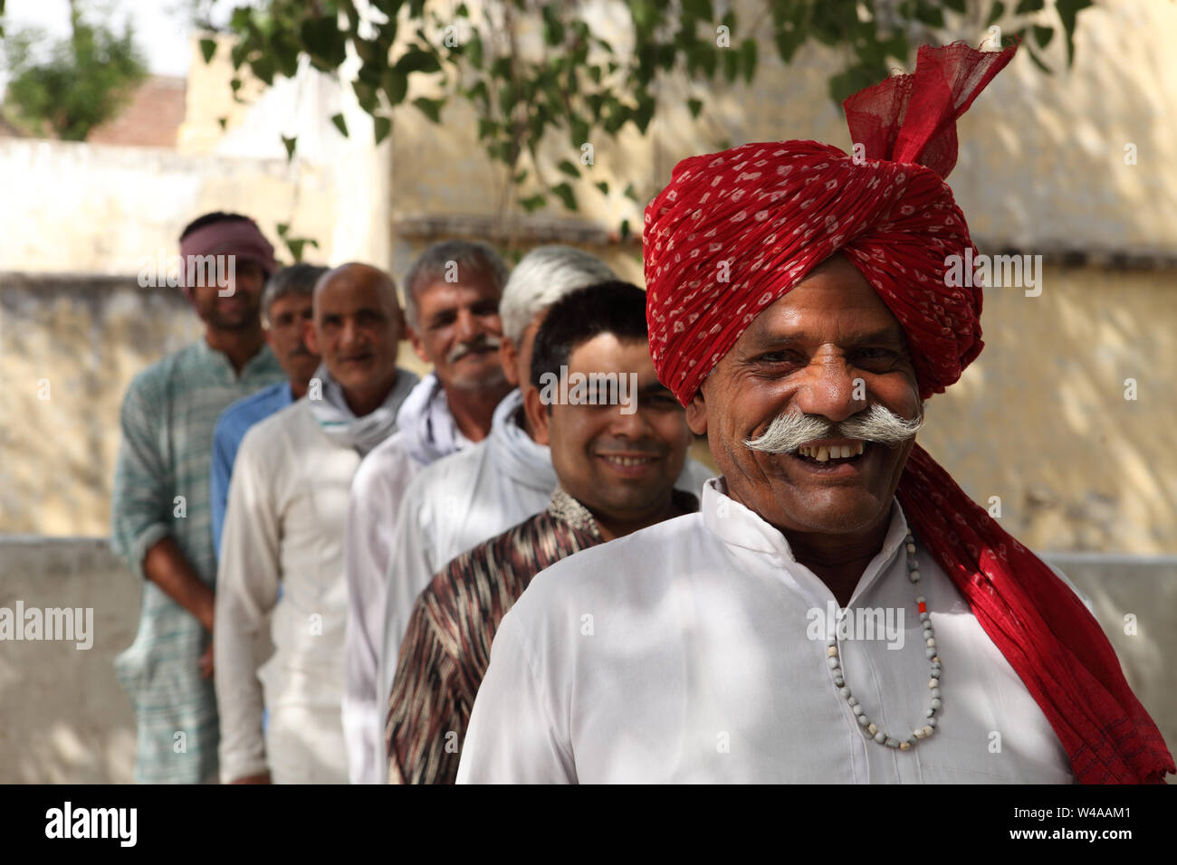 Voters queue in front hi-res stock photography and images - Alamy