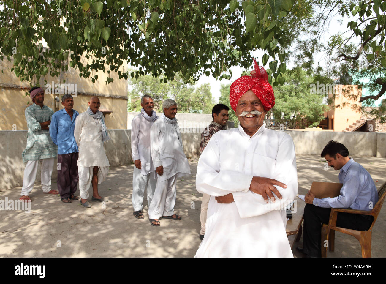 Rural people getting money Stock Photo - Alamy