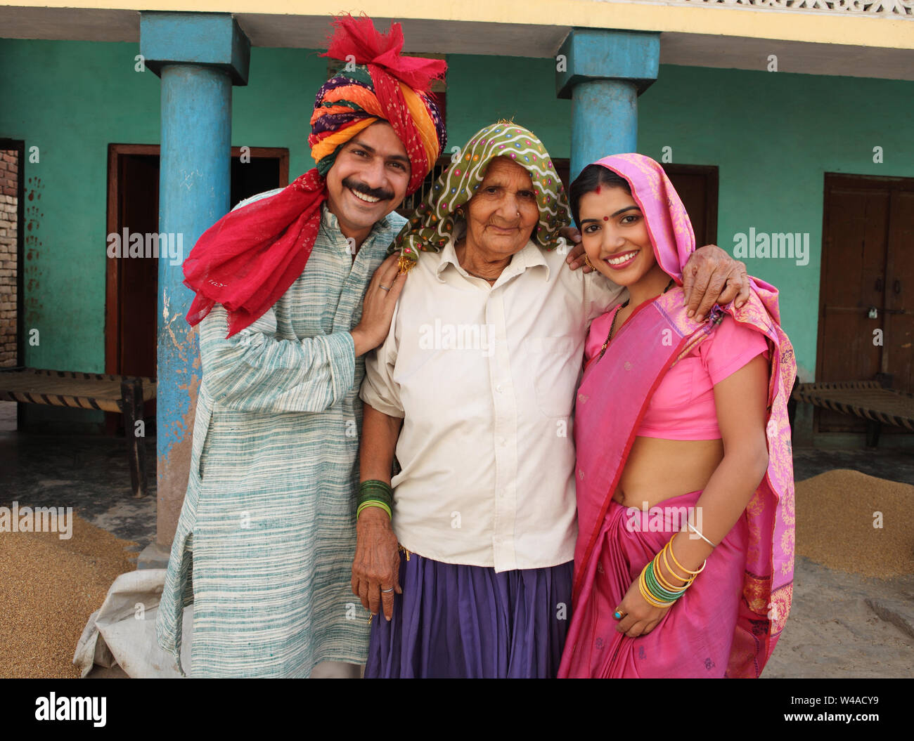 Rural family standing together and smiling Stock Photo - Alamy