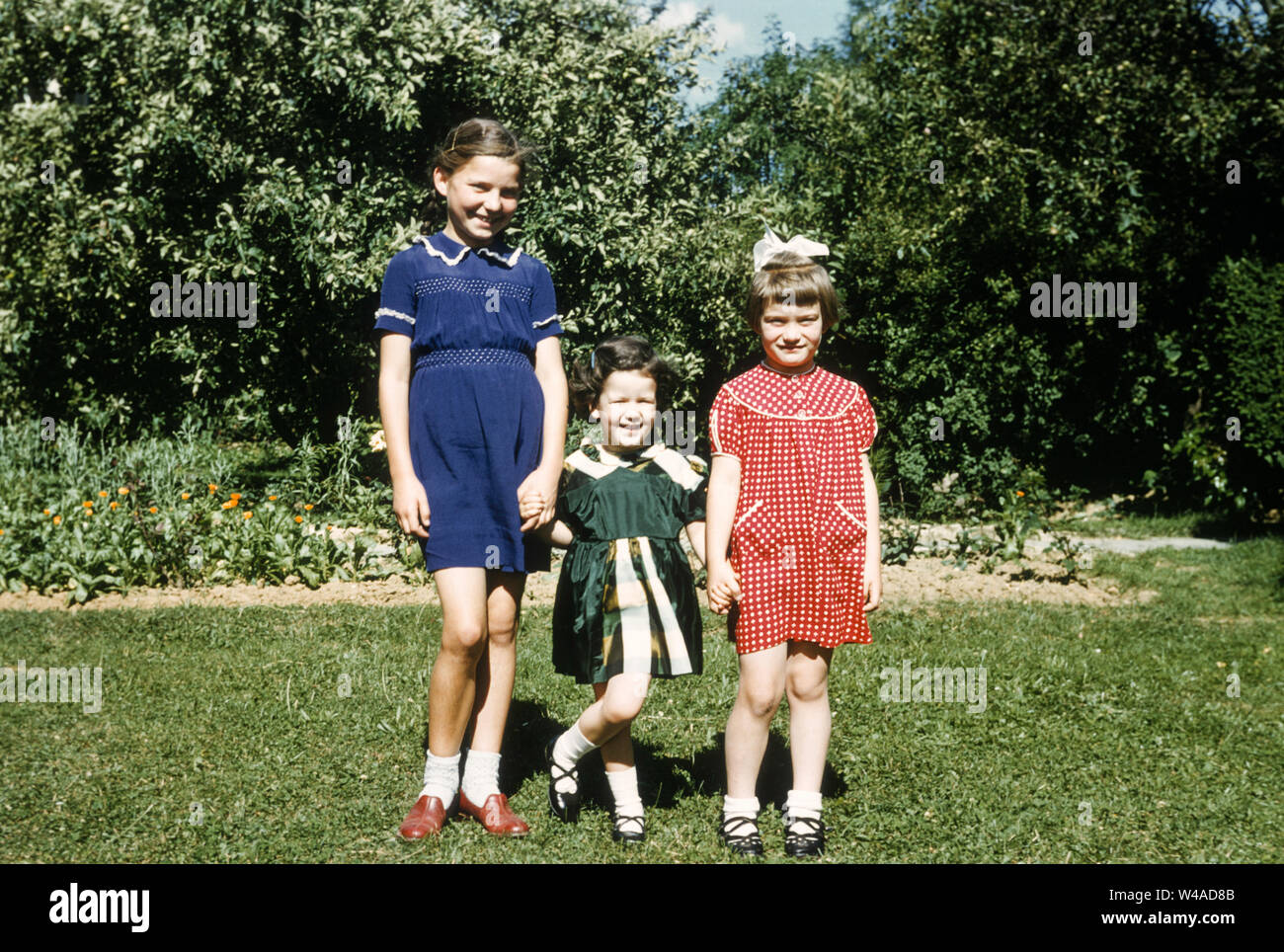 US Toddler Holding Hands with her German Friends, Germany, 1953 Stock ...