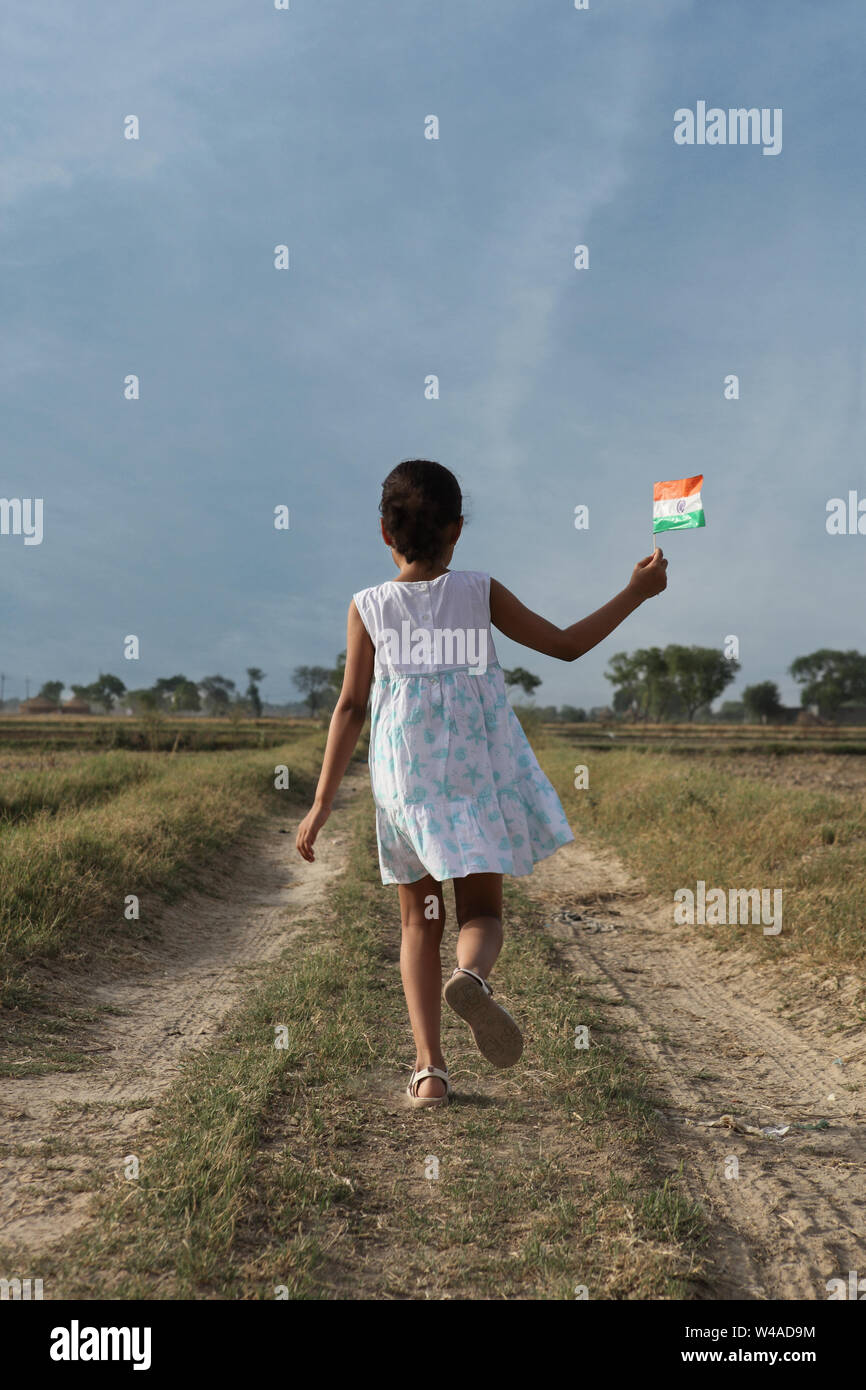 Indian girl running in field hi-res stock photography and images - Alamy