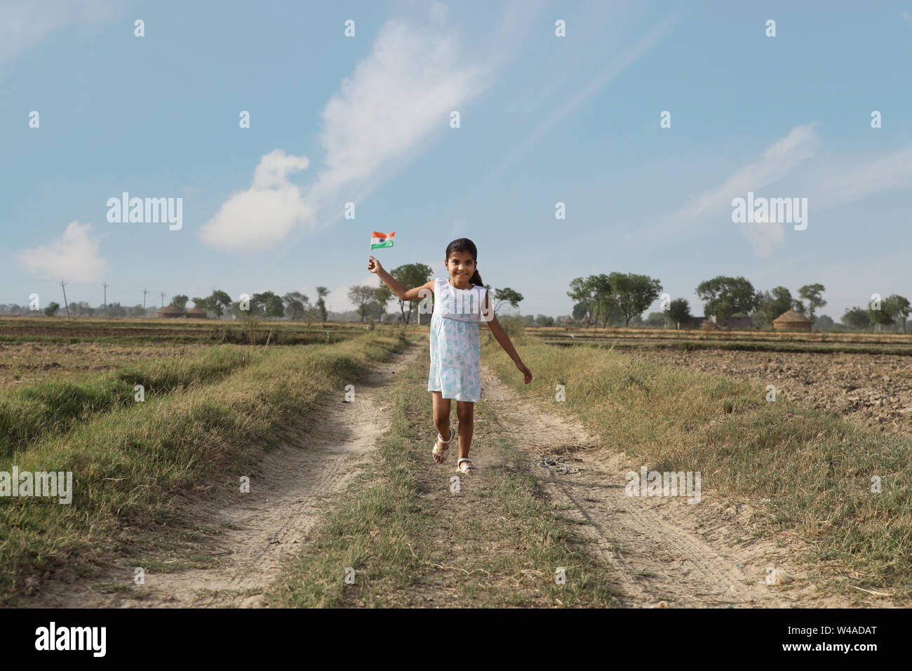 Indian girl running in field hi-res stock photography and images - Alamy