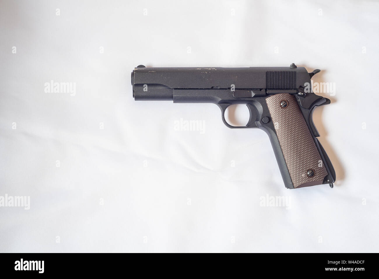 Handgun without magazine on white background Stock Photo - Alamy