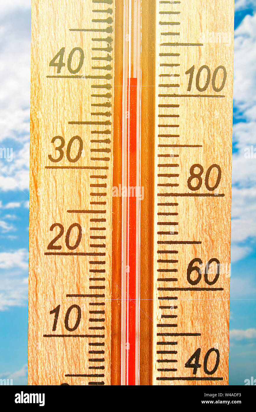 Thermometer displaying high 40 degree hot temperatures in sun summer ...
