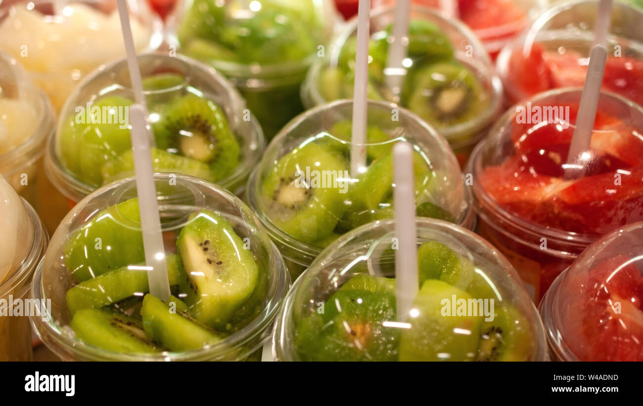 Fresh fruits in glasses are proportionally on display Stock Photo - Alamy